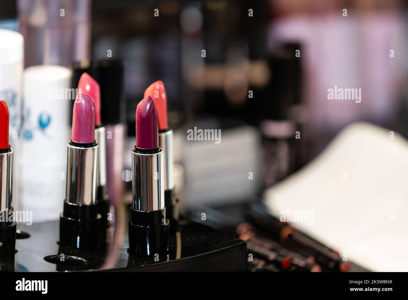 opened red lipstick on white background Stock Photo - Alamy