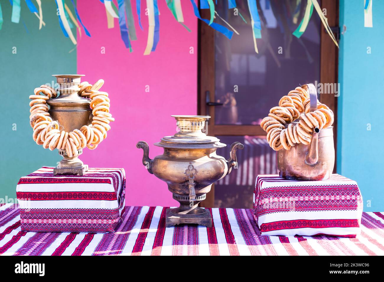 Bagels are hanging on the samovar. Tea from a samovar with bagels. Tea ...