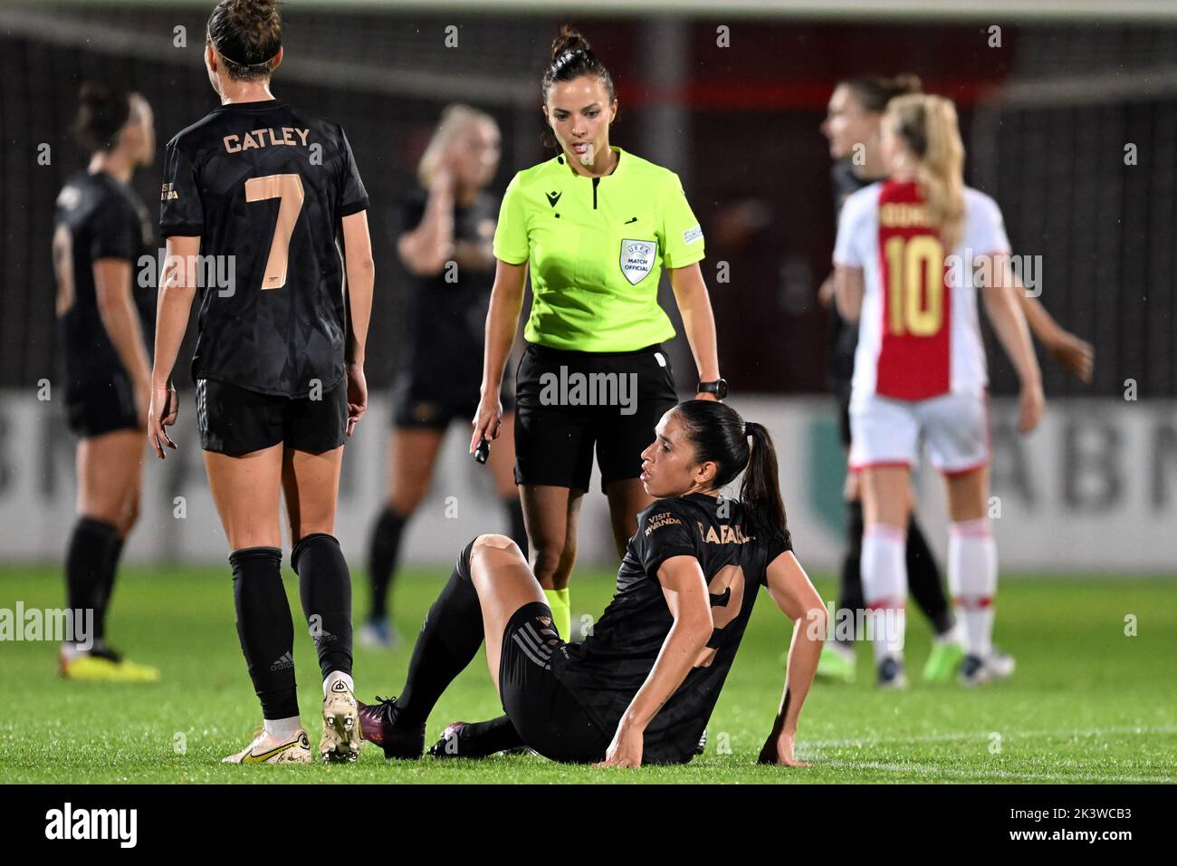 AMSTERDAM - (lr) Referee Marta Huerta de AzaSouza, Rafaelle of Arsenal ...