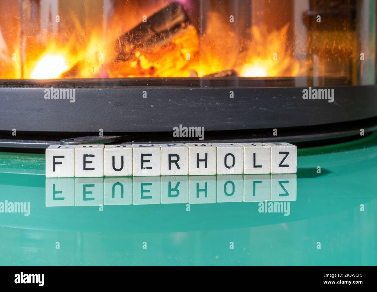 Fireplace with fire and the word firewood Stock Photo - Alamy