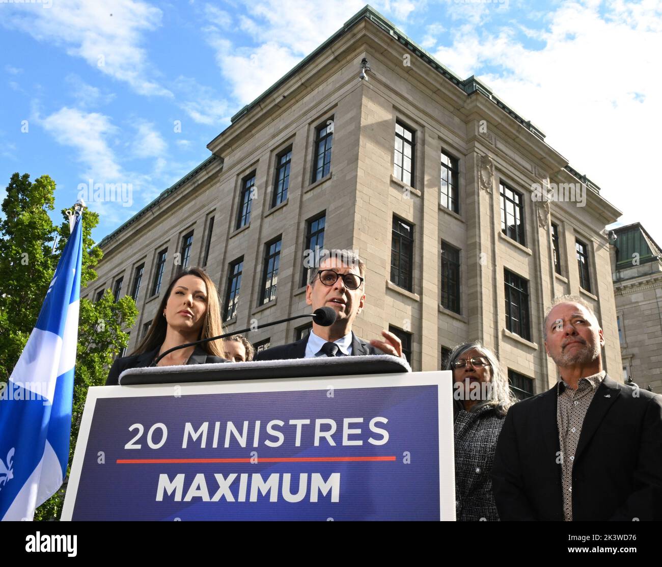 Quebec Conservative Leader Eric Duhaime, centre, announces his ...