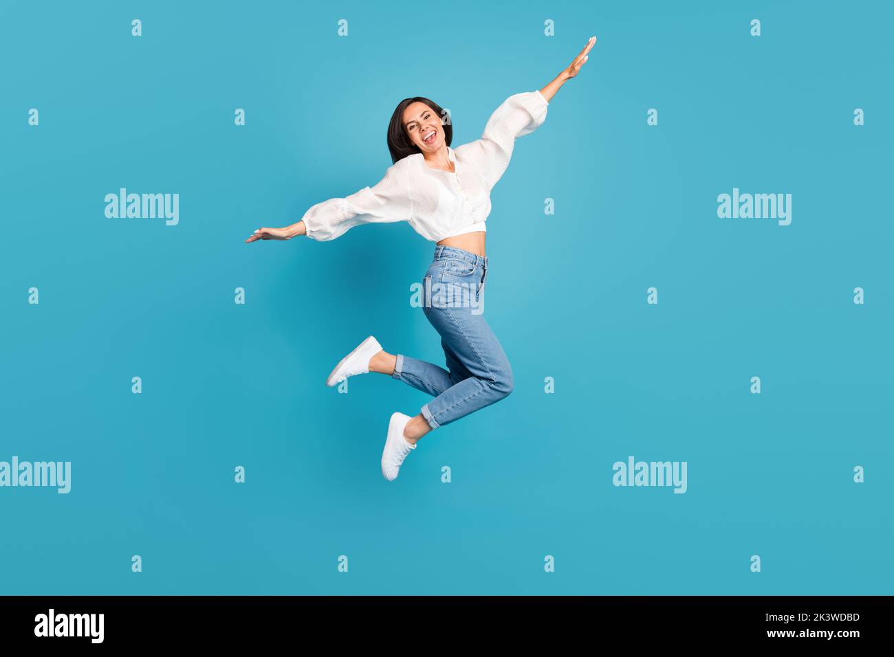 Full body photo of overjoyed pretty lady jumping flying good mood ...