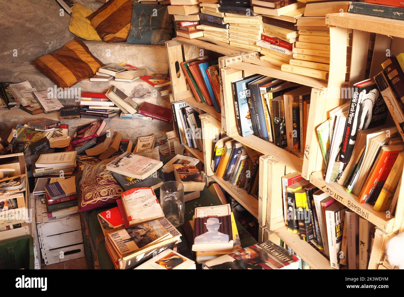Abandoned books piled up in a basement Stock Photo - Alamy