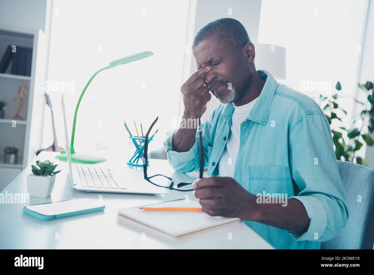 Profile side photo of mature businessman feeling tired touching nose ...