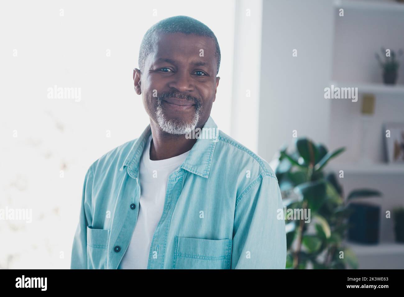 Portrait of handsome good mood aged man looking in camera enjoy chill ...
