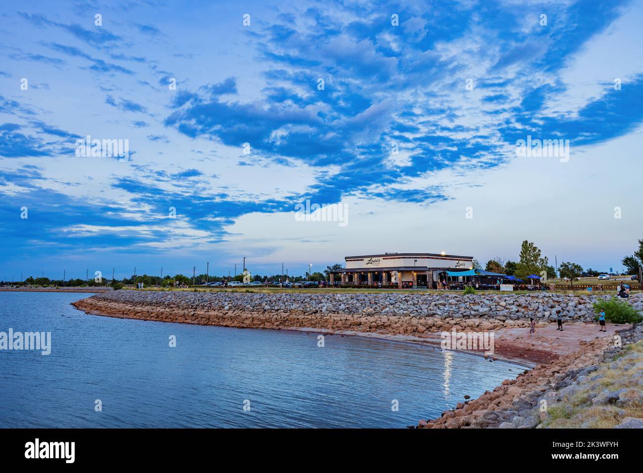 Oklahoma, AUG 27 2022 - Sunset view of the Louis grill restaurant Stock ...