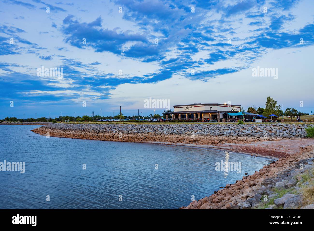 Oklahoma, AUG 27 2022 - Sunset view of the Louis grill restaurant Stock ...