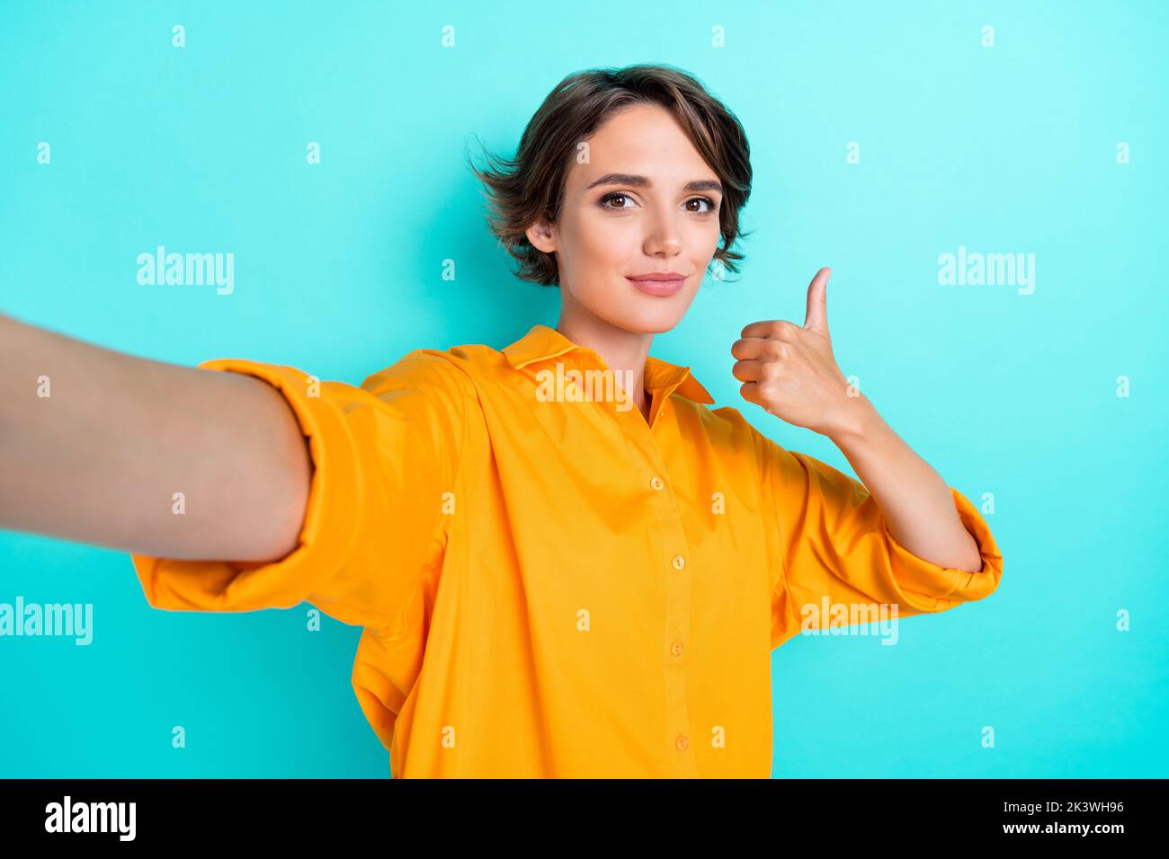 Photo of nice pretty gorgeous girl bob hairdo wear orange blouse making ...