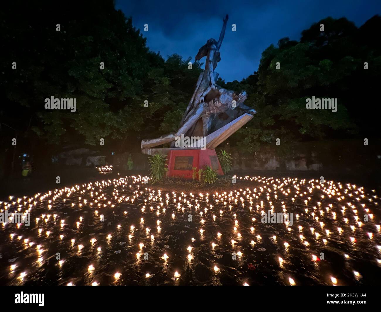 Around 3,000 candles representing the people who were brutally killed ...