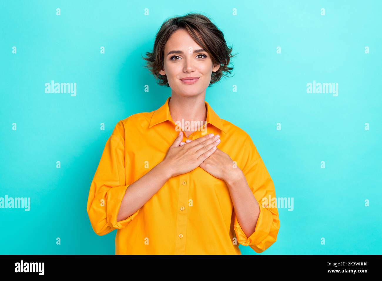 Photo of young pretty nice cute adorable woman wear office shirt folded ...