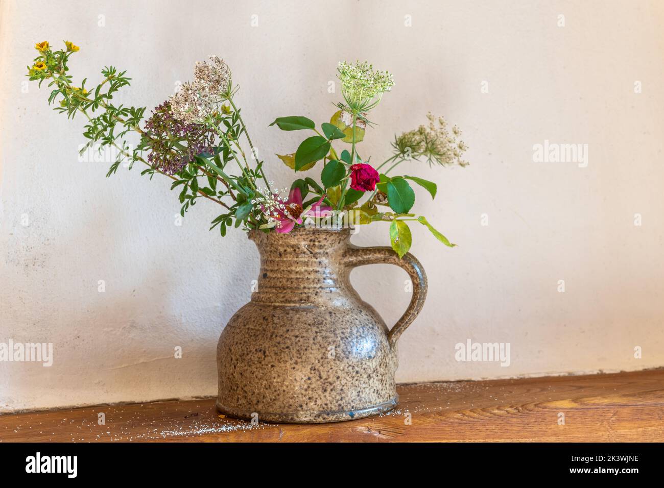 Bouquet of natural flowers in decorative pot. France Stock Photo - Alamy