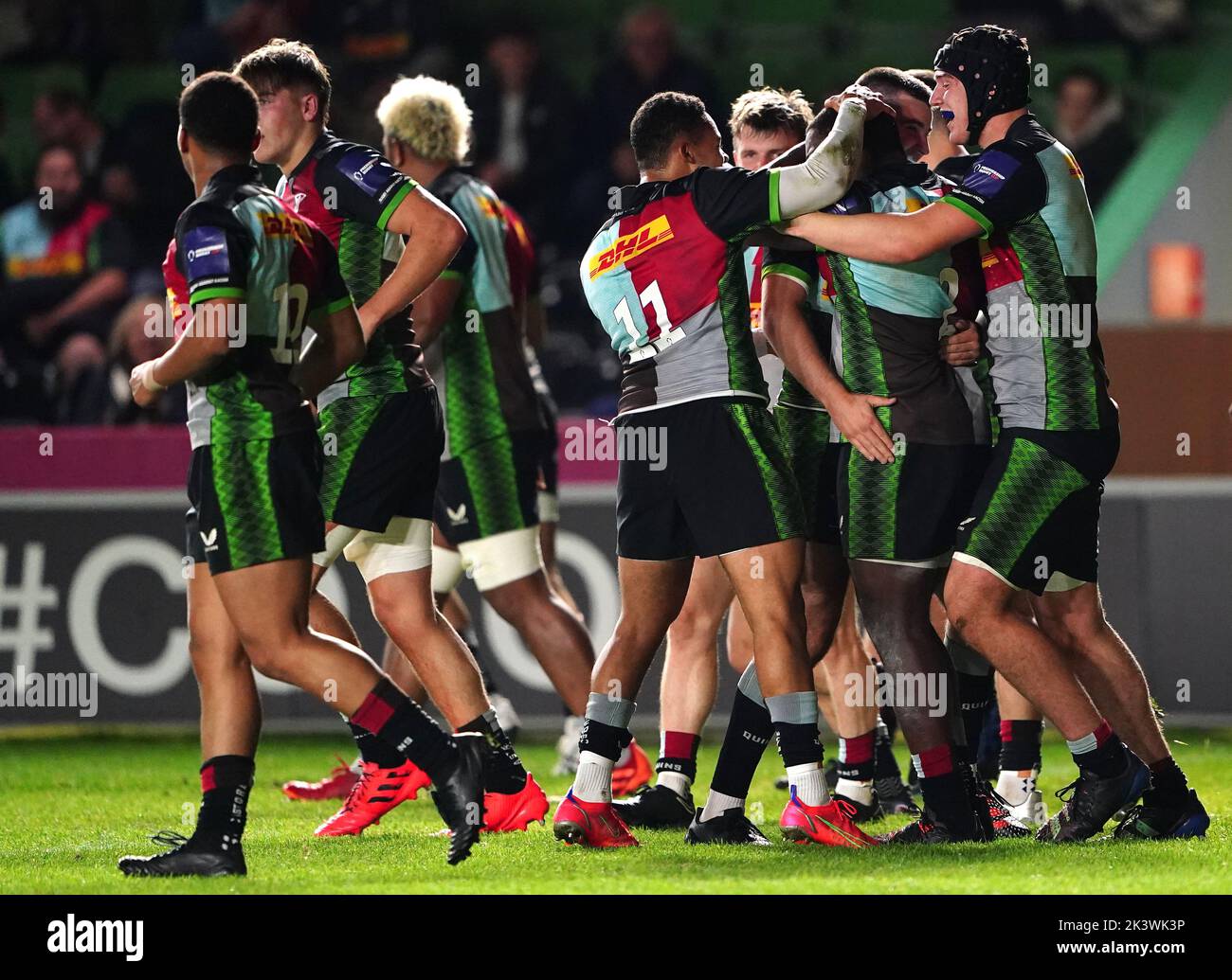 Harlequins' Nathan Jibulu celebrates scoring their side's first try of ...