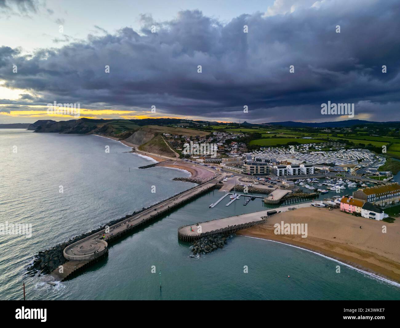 West Bay, Dorset, UK. 28th September 2022. UK Weather. View from the air of the piers and ...
