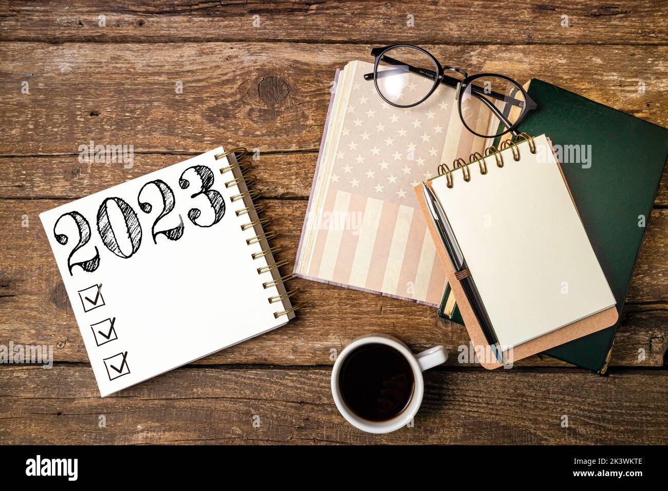 New year goals 2023 on desk. 2023 resolutions list with notebook ...