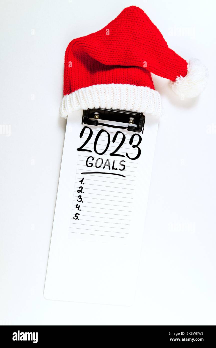 New year resolutions 2023 on desk. 2023 resolutions list with notebook ...