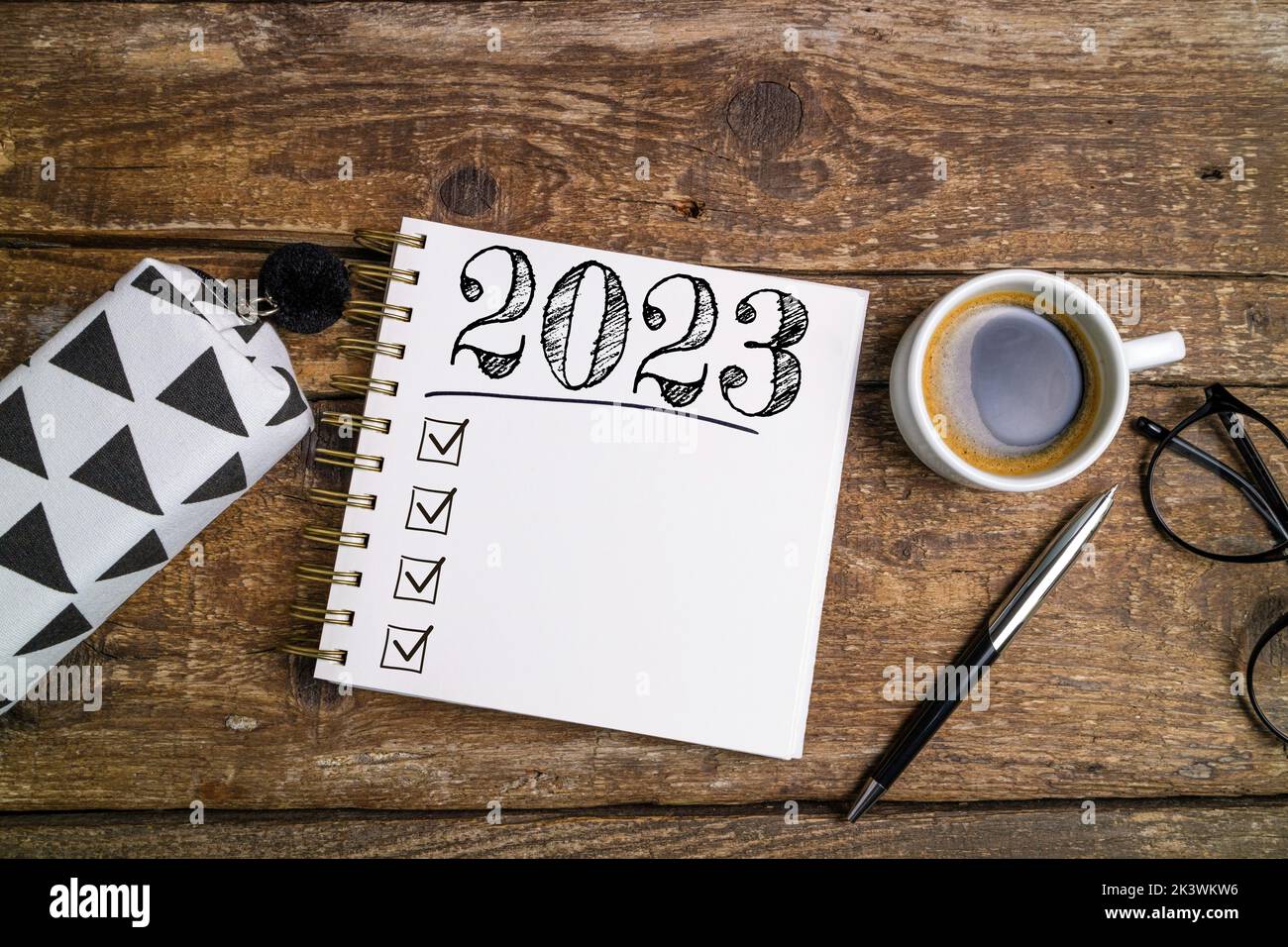 New year goals 2023 on desk. 2023 resolutions list with notebook ...
