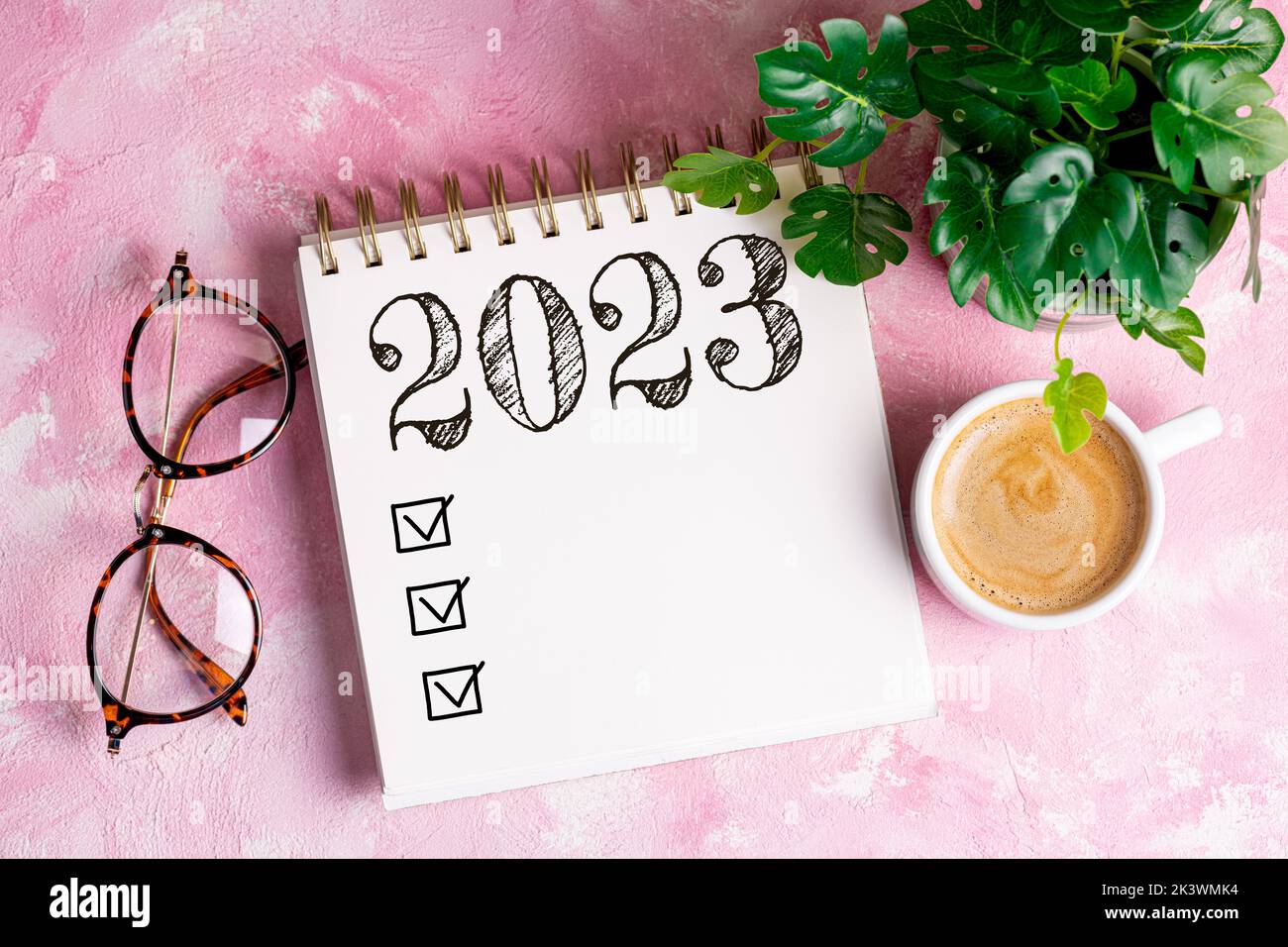 New year resolutions 2023 on desk. 2023 resolutions list with notebook ...