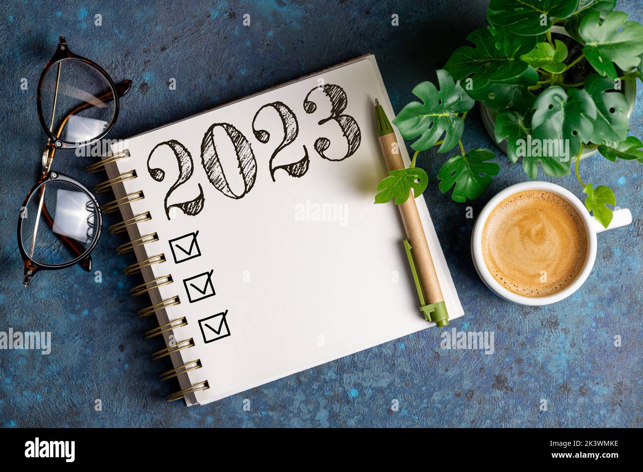 New year resolutions 2023 on desk. 2023 resolutions list with notebook ...