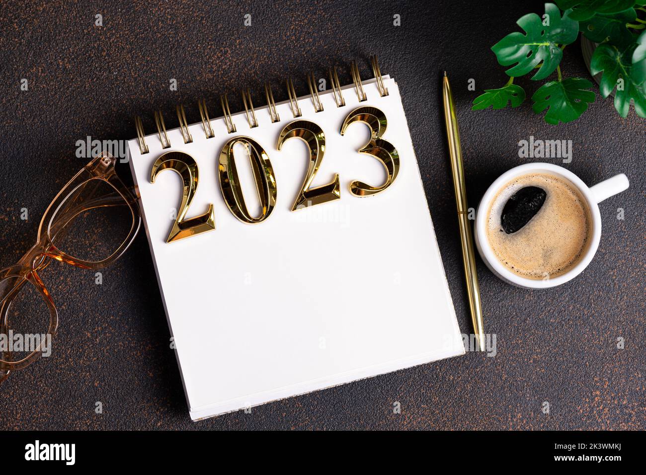 New year resolutions 2023 on desk. 2023 resolutions list with notebook ...