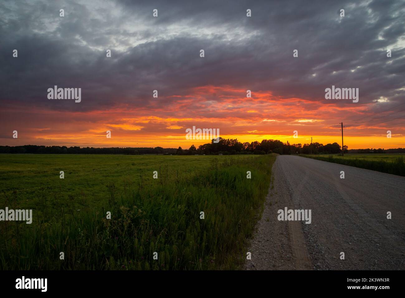 Scenic rural landscape with rural broken dirt road at sunset Stock ...