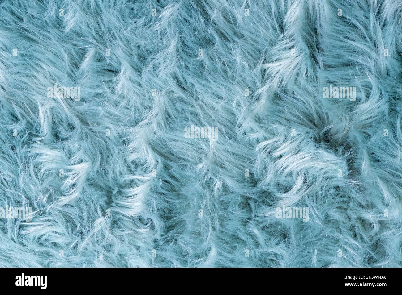 Blue artificial hairy fur blanket hi-res stock photography and images ...