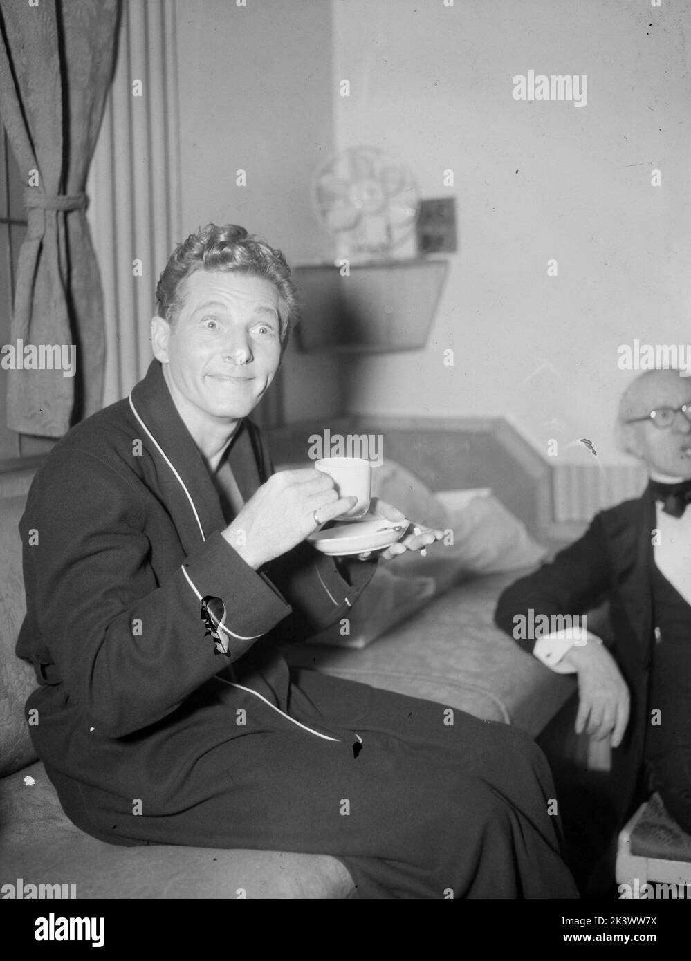 April 2 1969 American Actor Danny Kaye Sitting On A Couch In His Dressing Gown Sipping Tea