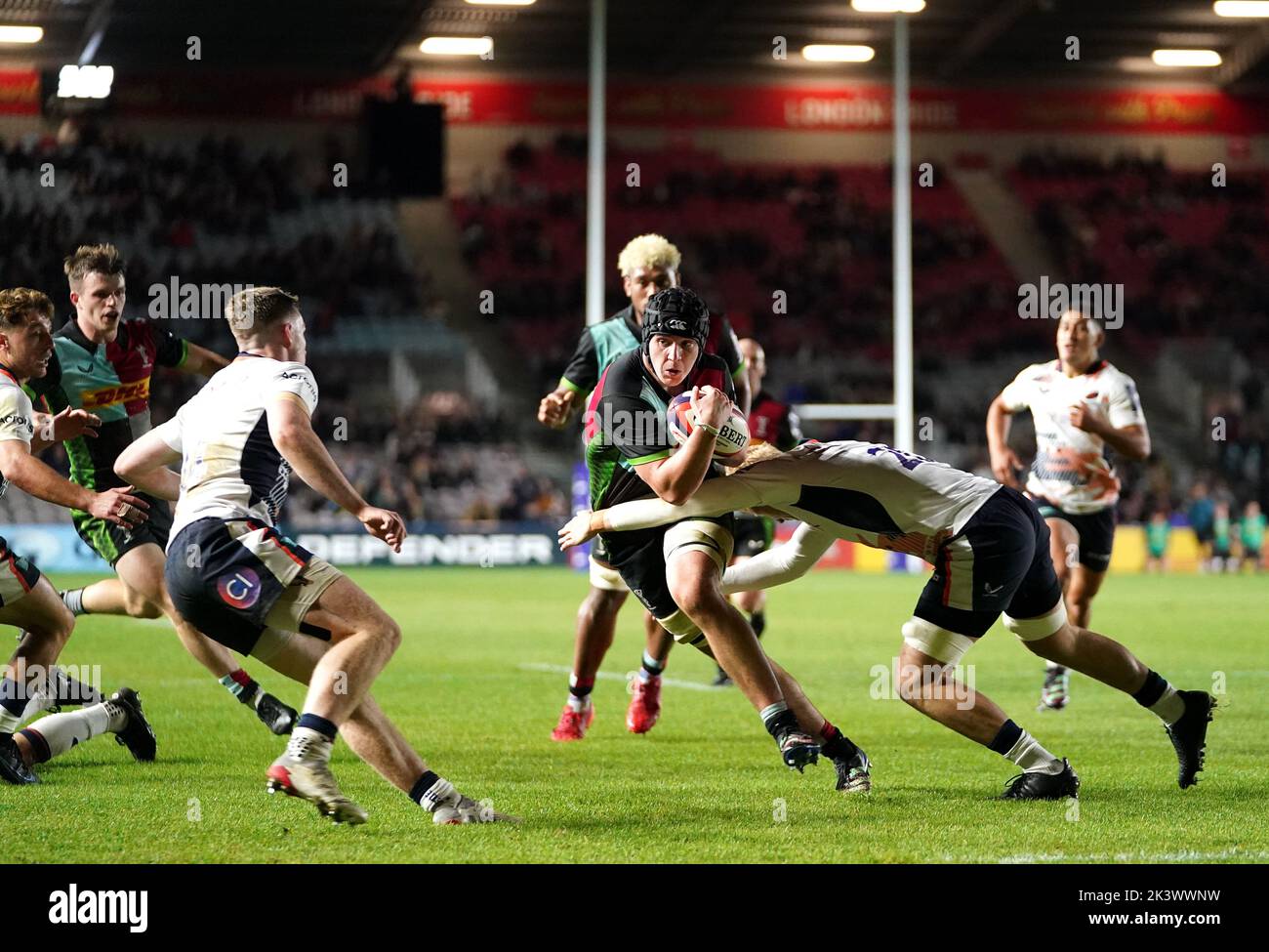 Harlequins' Jonny Green tackled by Saracens' Charlie Bracken during the ...