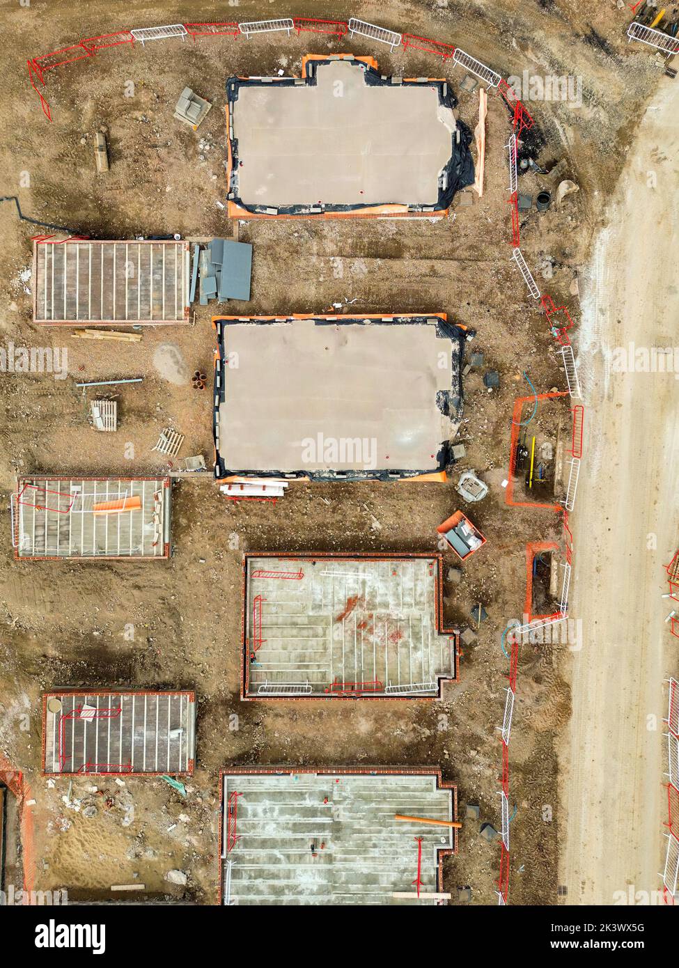 Aerial view directly above the concrete foundations for new houses ...