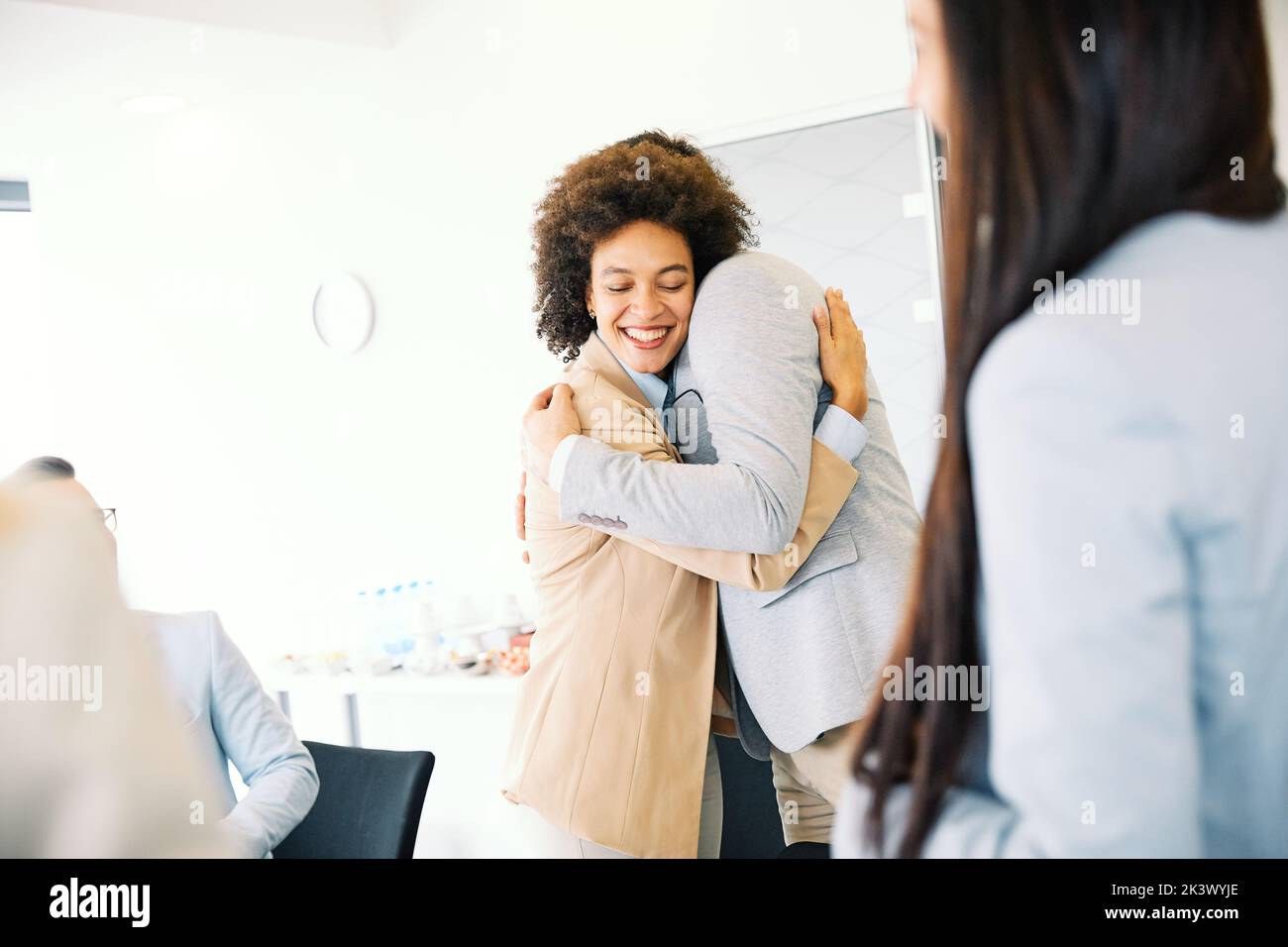 hug hugging coworker love partner office business happy relationship ...