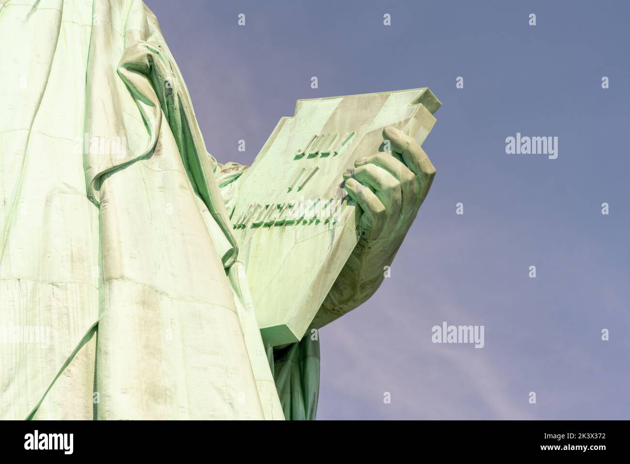 Declaration of Independence in the hand of the statue of liberty with ...