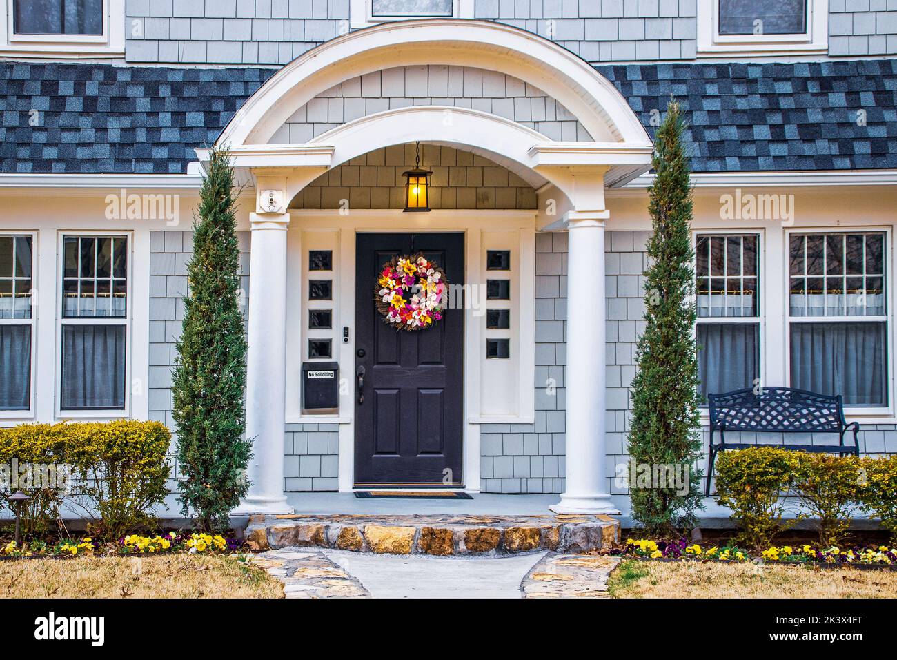 Bluish Grey cedar shake shingled home with drama added by gently curved ...