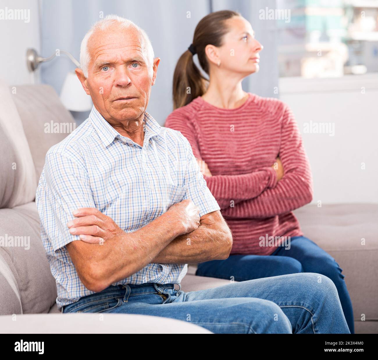 Home quarrel adult daughter and elderly father Stock Photo - Alamy