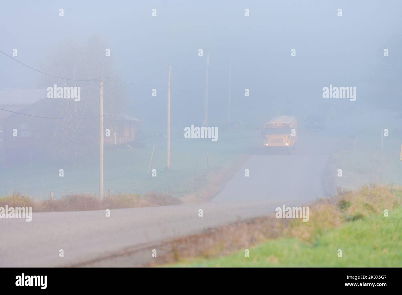 School bus on an early foggy morning, Stowe, Vermont, USA Stock Photo ...