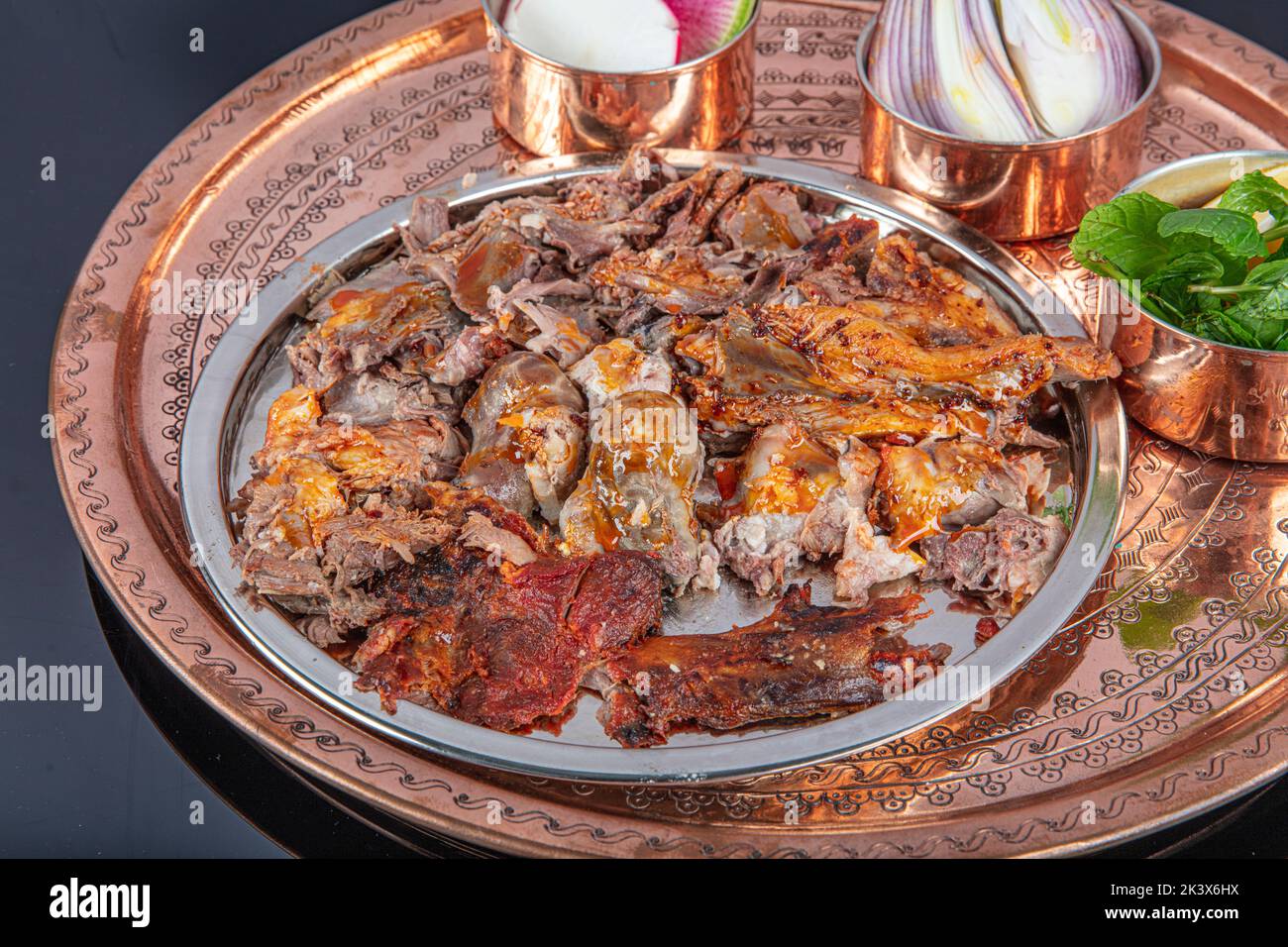 Turkey national cuisine dish Roasting lamb with meat. Roasted head of ...