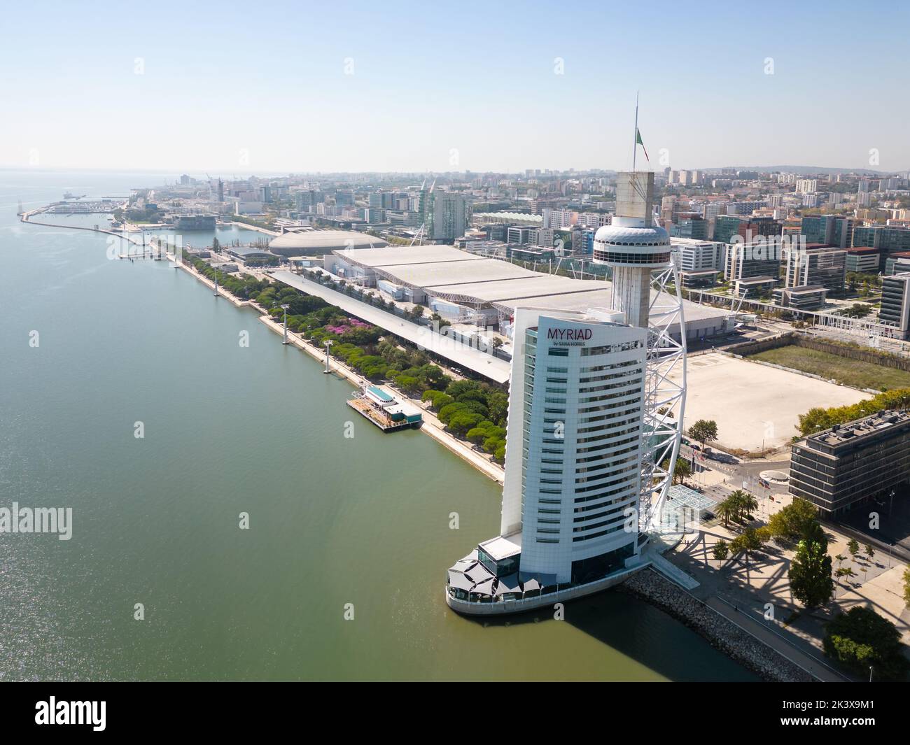 Aerial footage of the Vasco da Gama Tower at Park of The Nations in ...