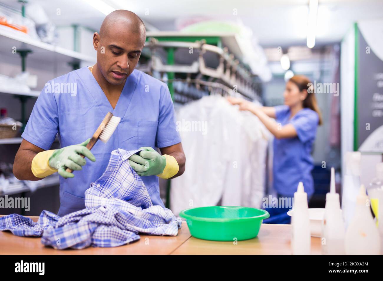 Male cleaner overall hi-res stock photography and images - Alamy