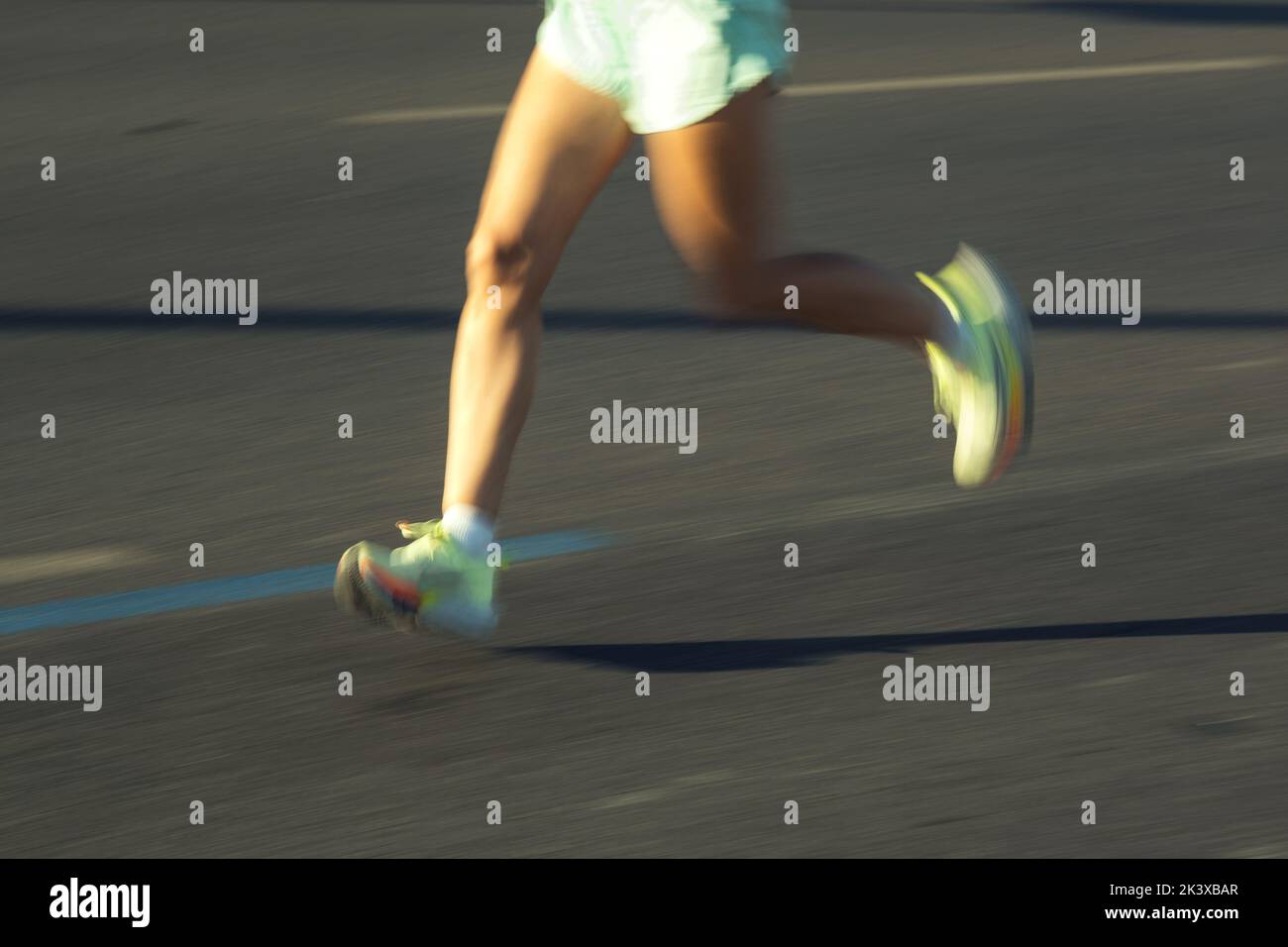 Close up shot feet with motion blur of the Competitors running in the ...