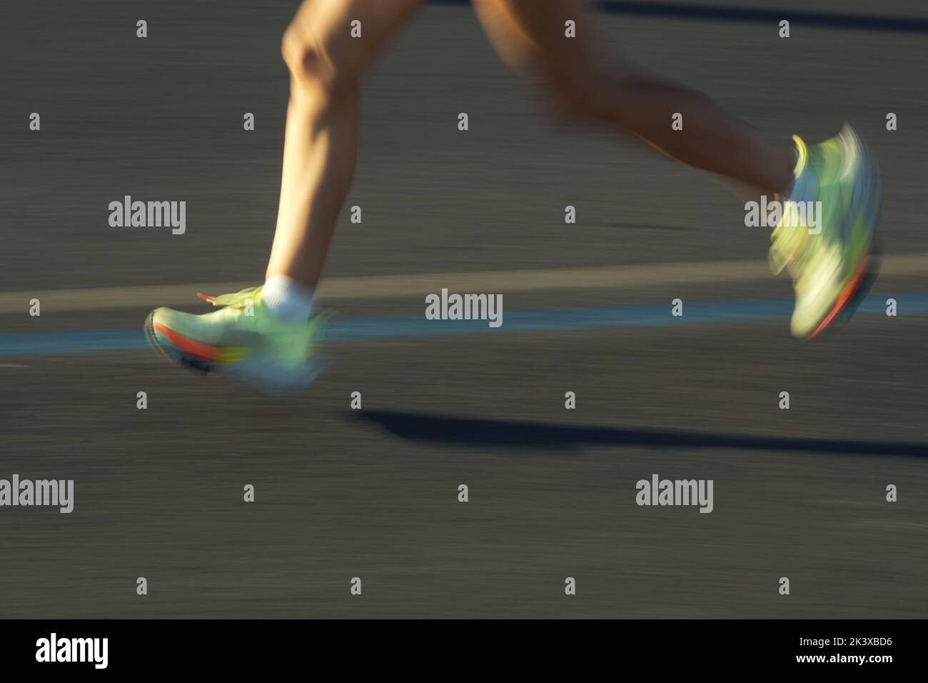 Close up shot feet with motion blur of the Competitors running in the ...
