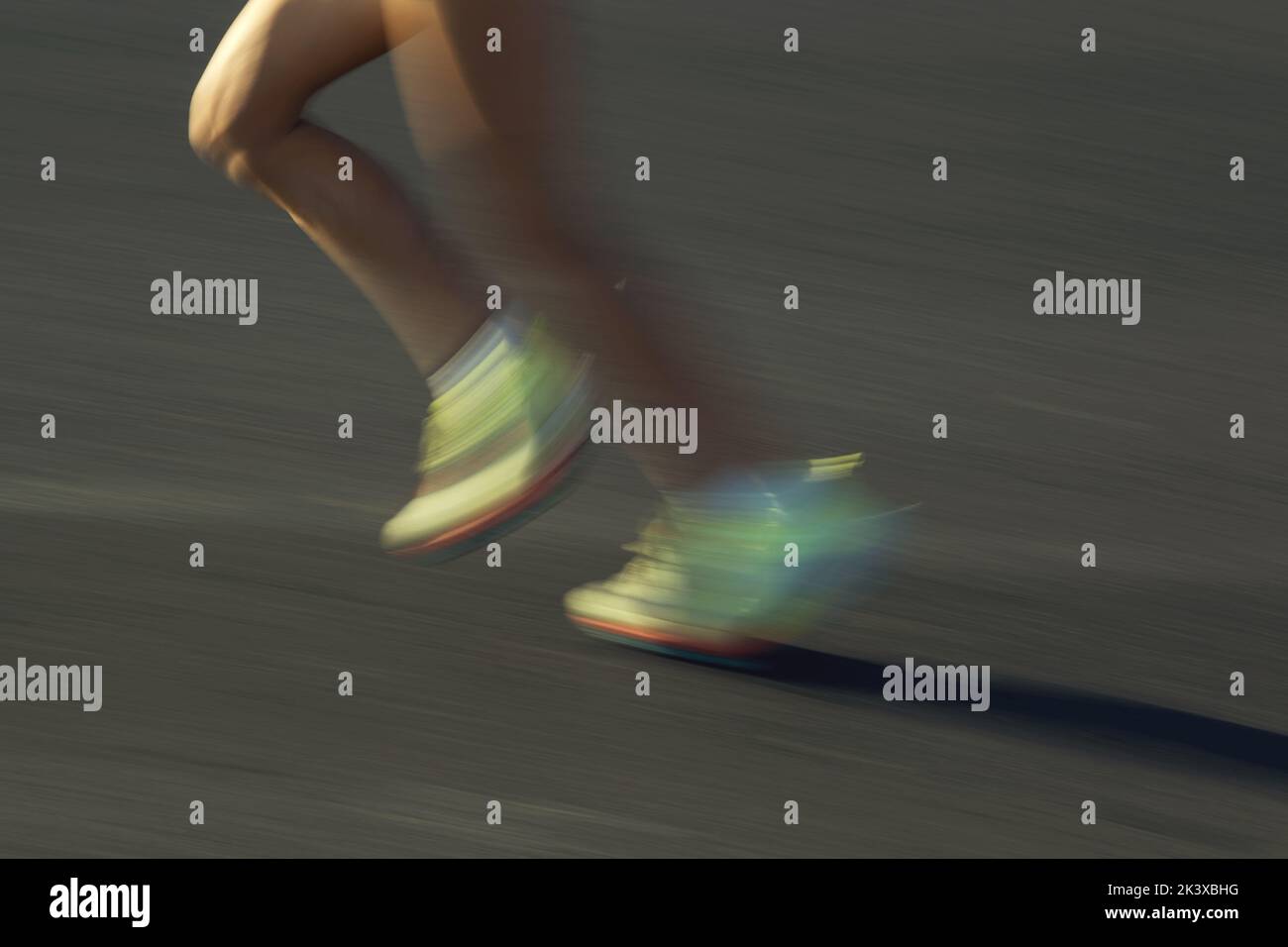 Close up shot feet with motion blur of the Competitors running in the ...