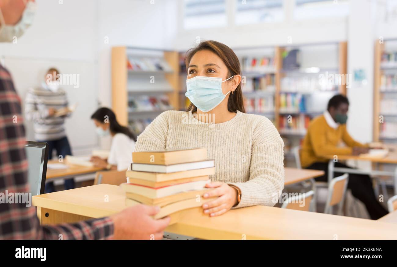Returning book library hi-res stock photography and images - Alamy