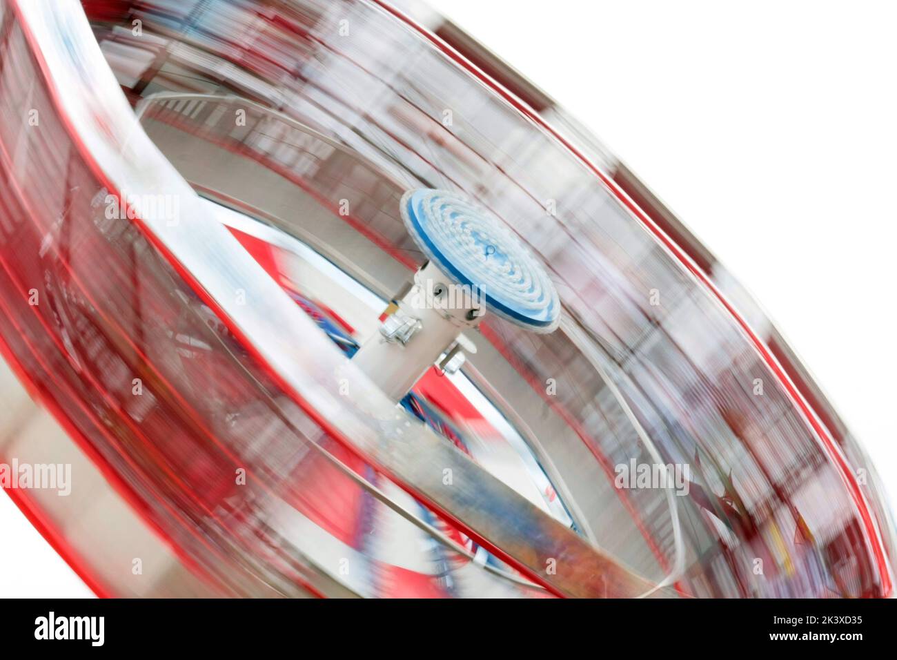 A long exposure shot of Tilt A Whirl ride during turning with high ...
