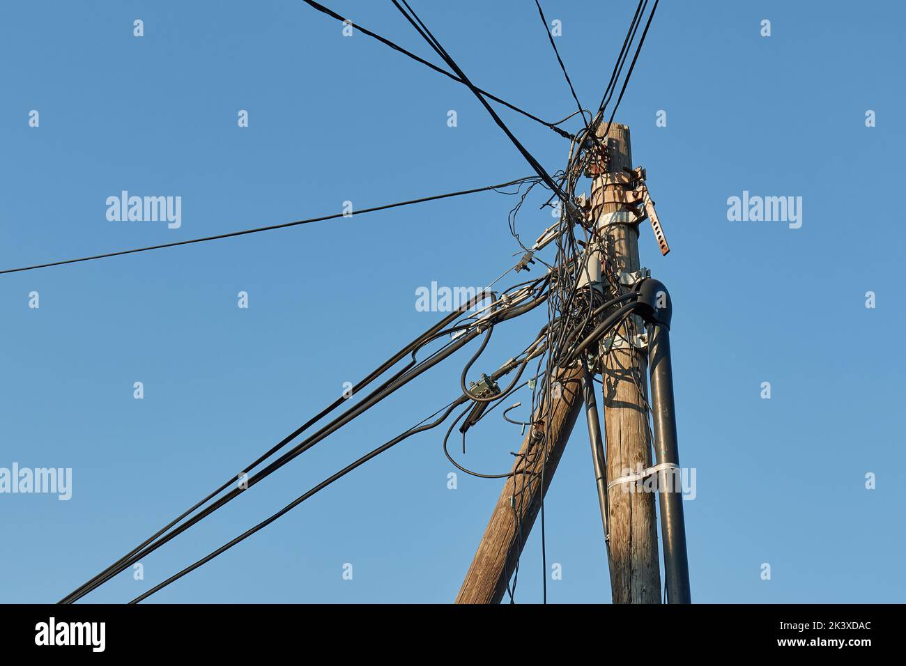 Electric lines post many wires Stock Photo - Alamy