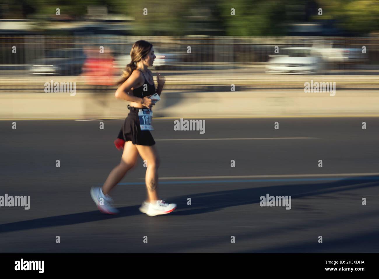 Izmir, Turkey - September 11, 2022: Running woman with motion blur in ...