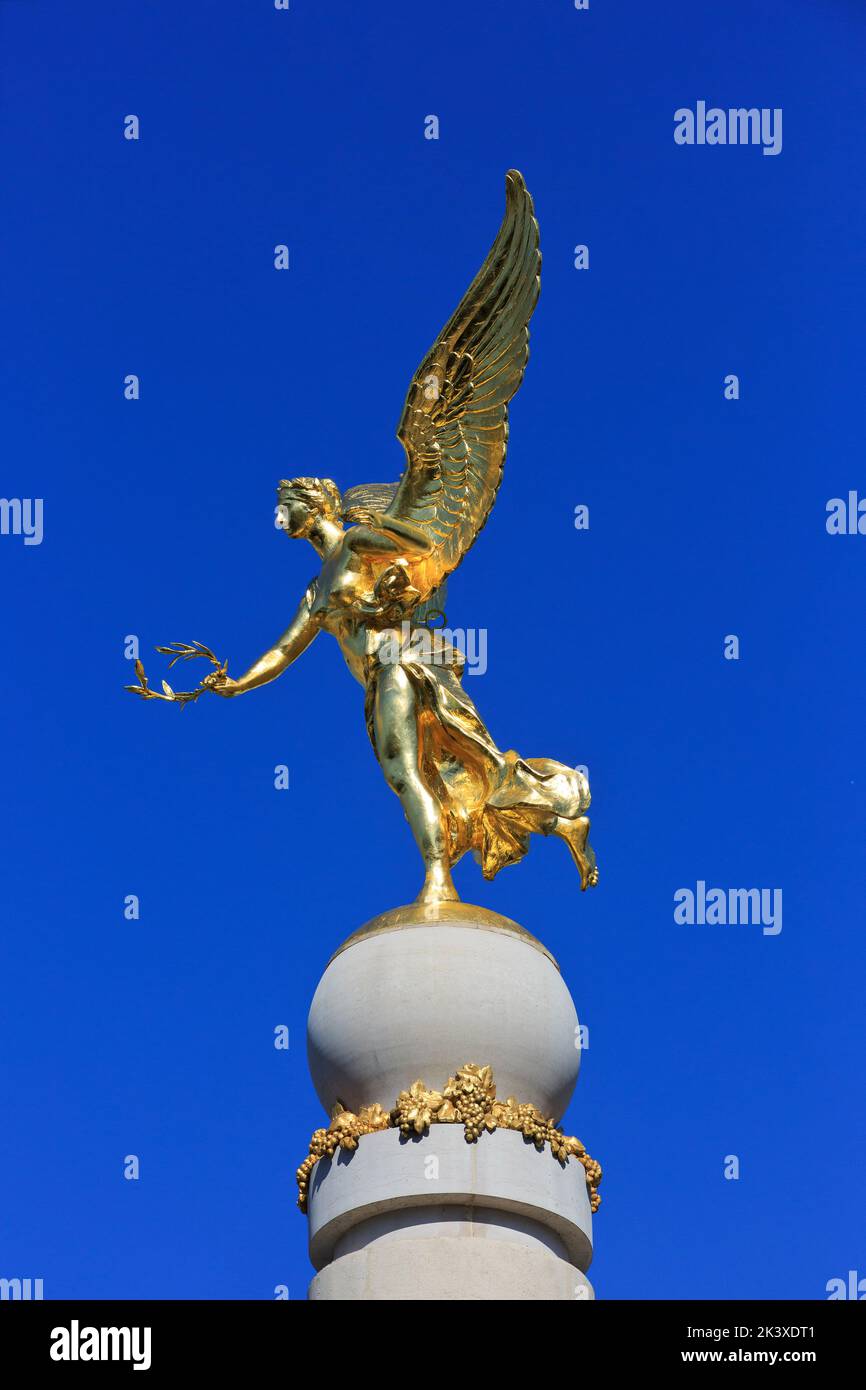 Gilded statue of an angel on top of the Subé Fountain (1906) at Place ...