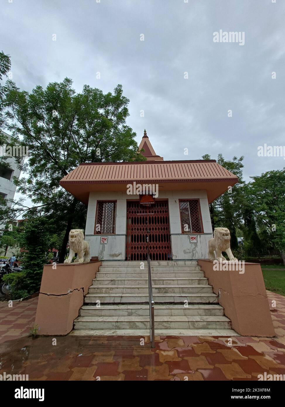 A tample Lord Hanuman mandir against gray sky Stock Photo - Alamy