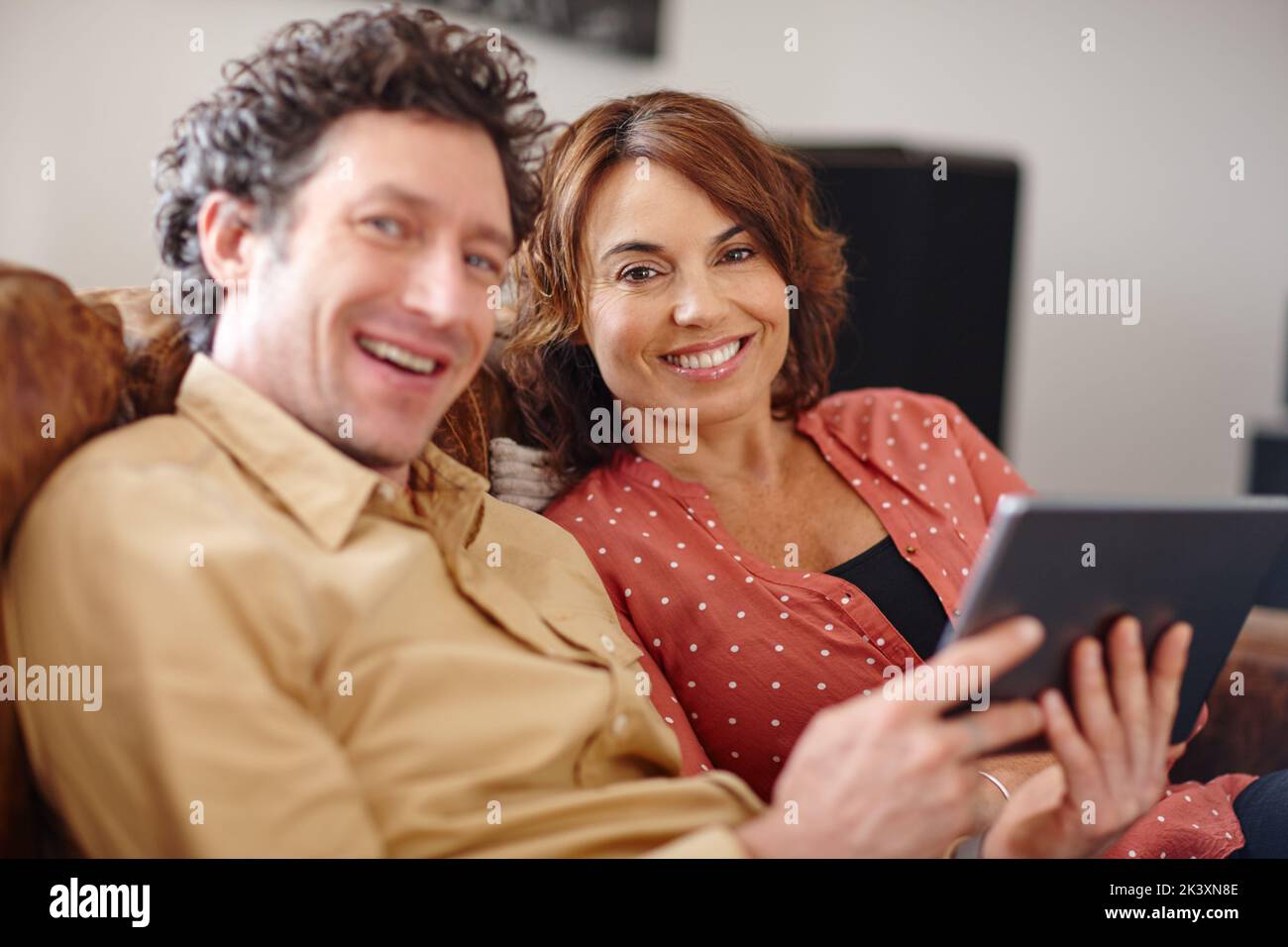 Our idea of a perfect weekend. a husband and wife using a digital ...