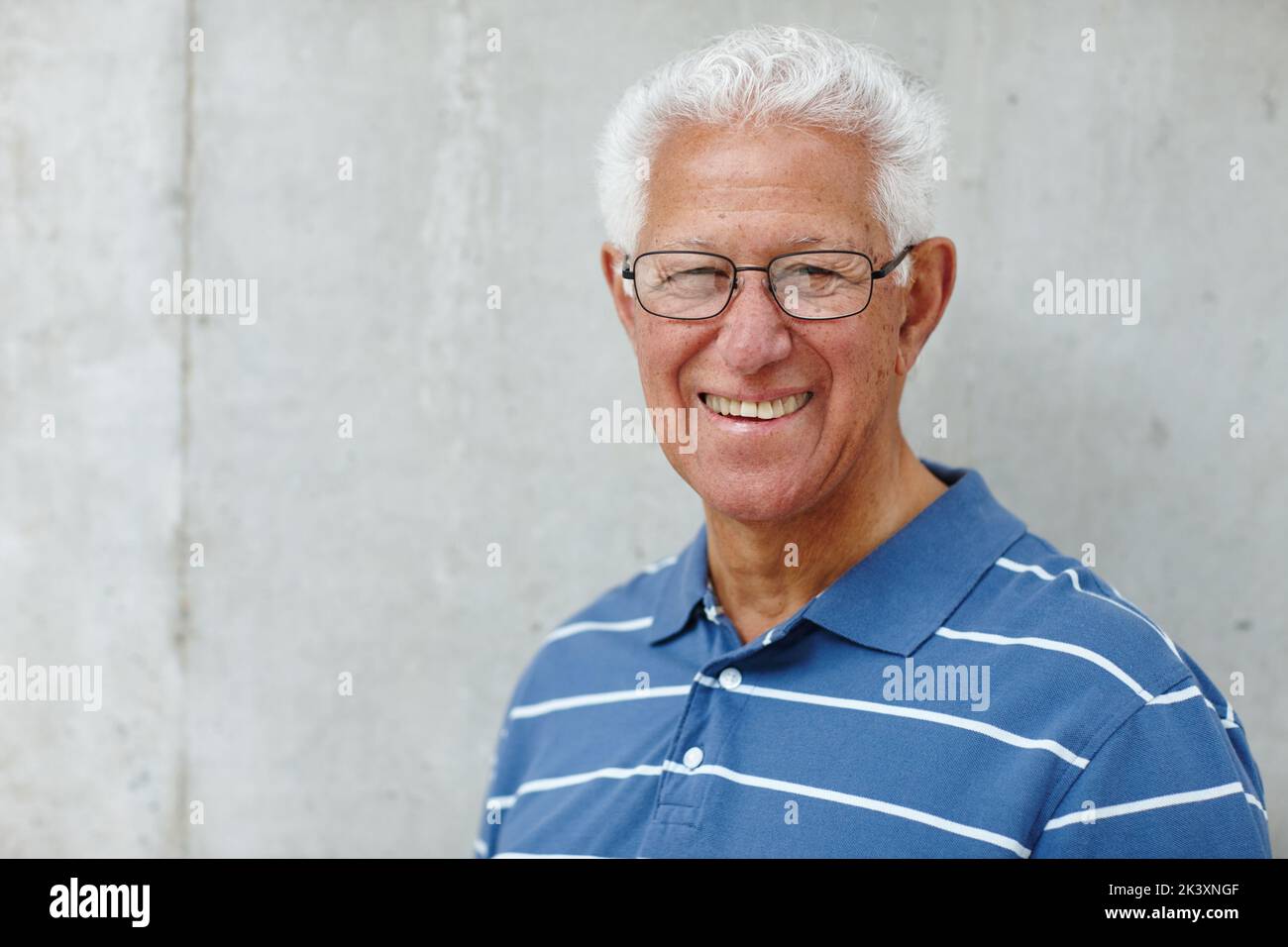 Confidence is the key. Portrait of a senior man smiling at the camera ...