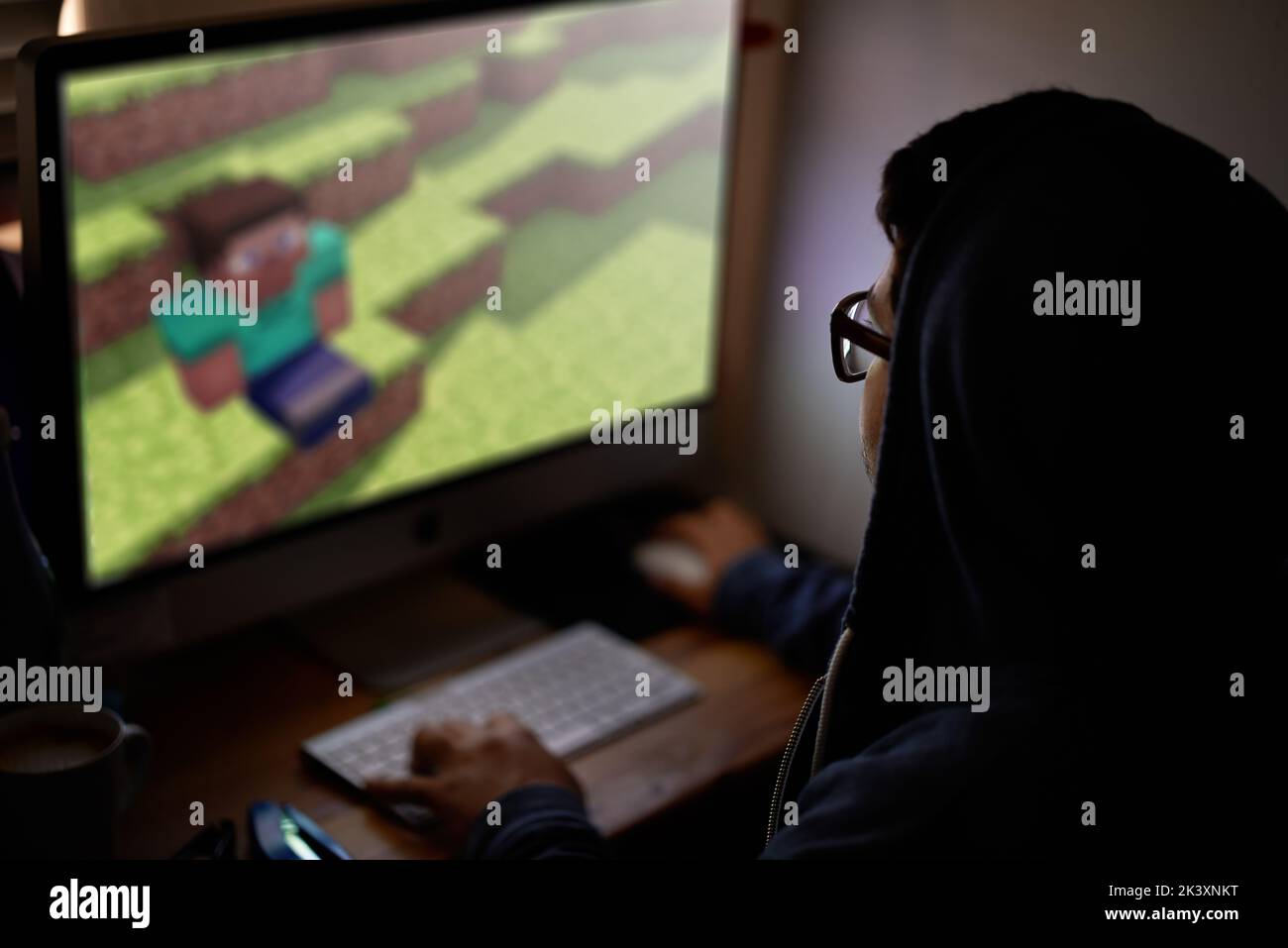 He needs to get out more. a young gamer focused on his game. ALL design ...