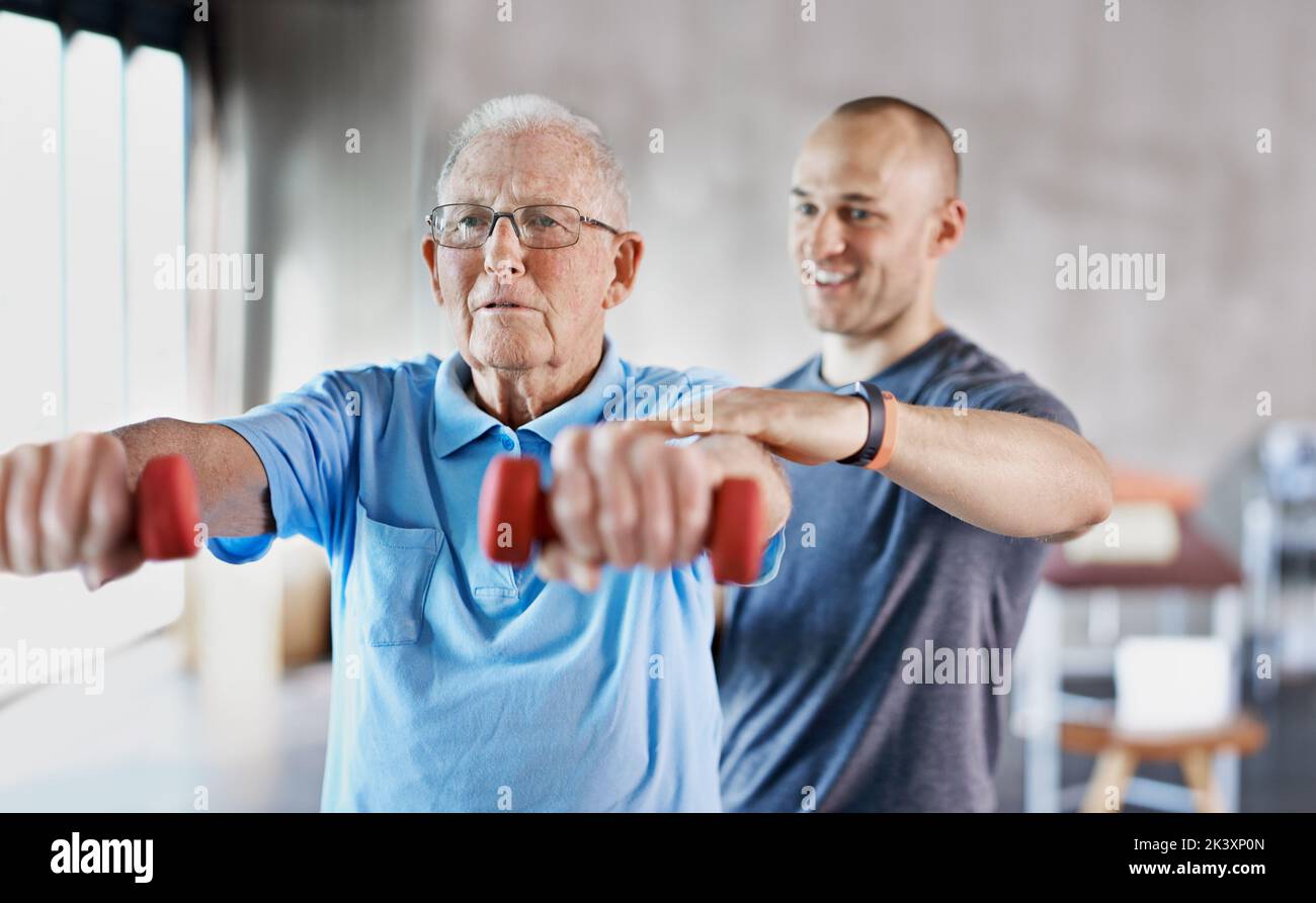 Making a move towards a healthy retirement. a senior man working out ...