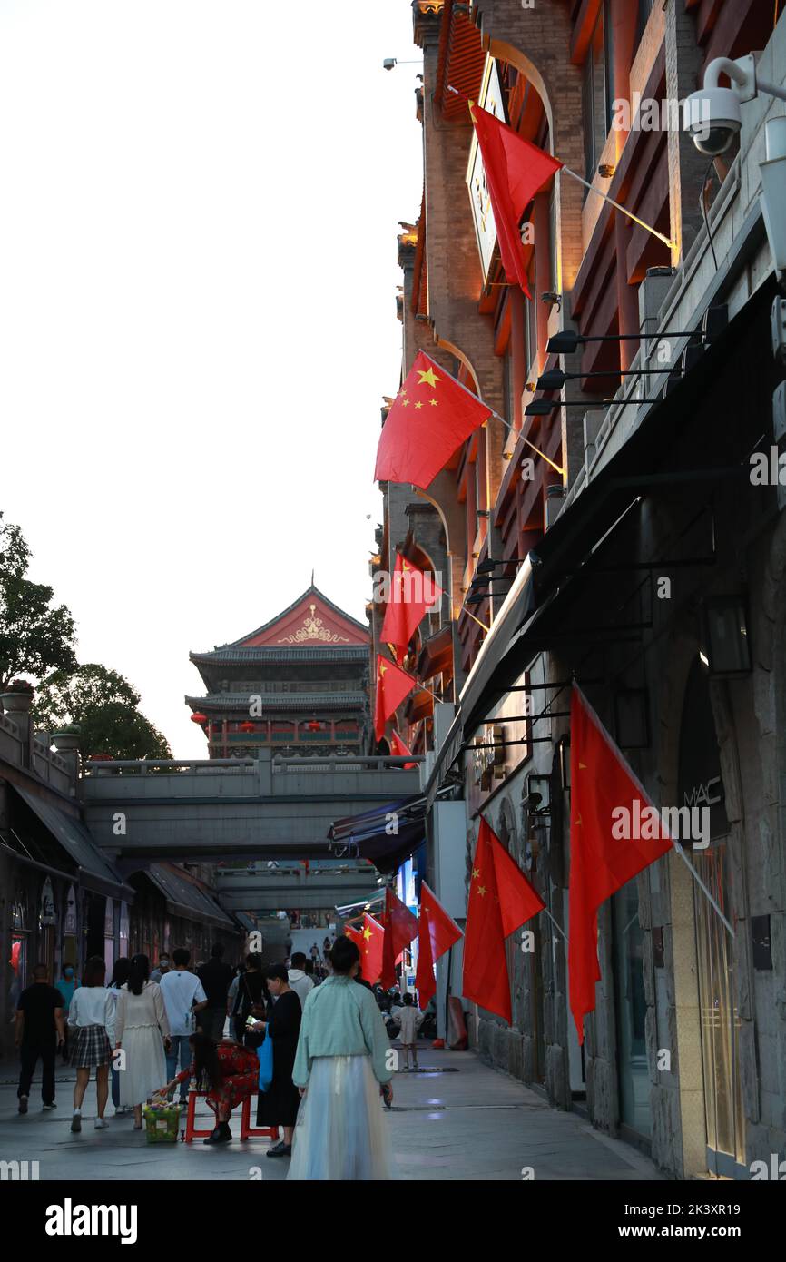 XI'AN, CHINA - SEPTEMBER 28, 2022 - National flags fly on a street in ...